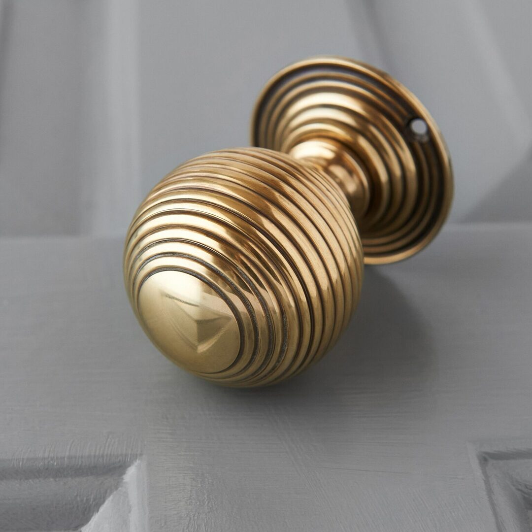 Large Beehive Aged Brass Door Knobs
